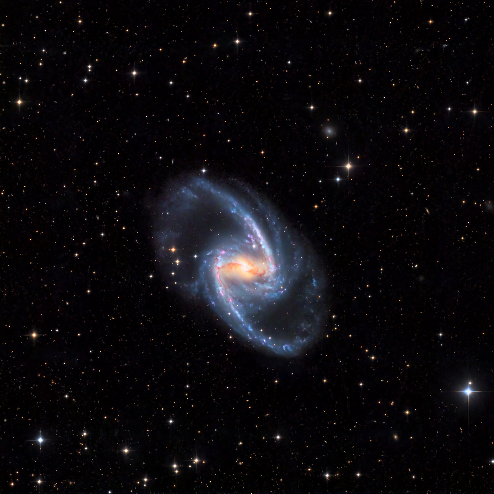 NGC 1365 The Great Barred Spiral Galaxy | Telescope Live